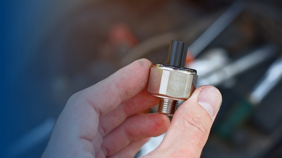 What is a knock sensor and how does it work?